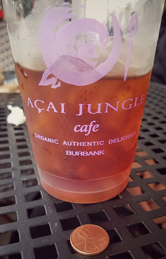 Acai Jungle Cafe cold brew and the penny | The Road Linds Travels